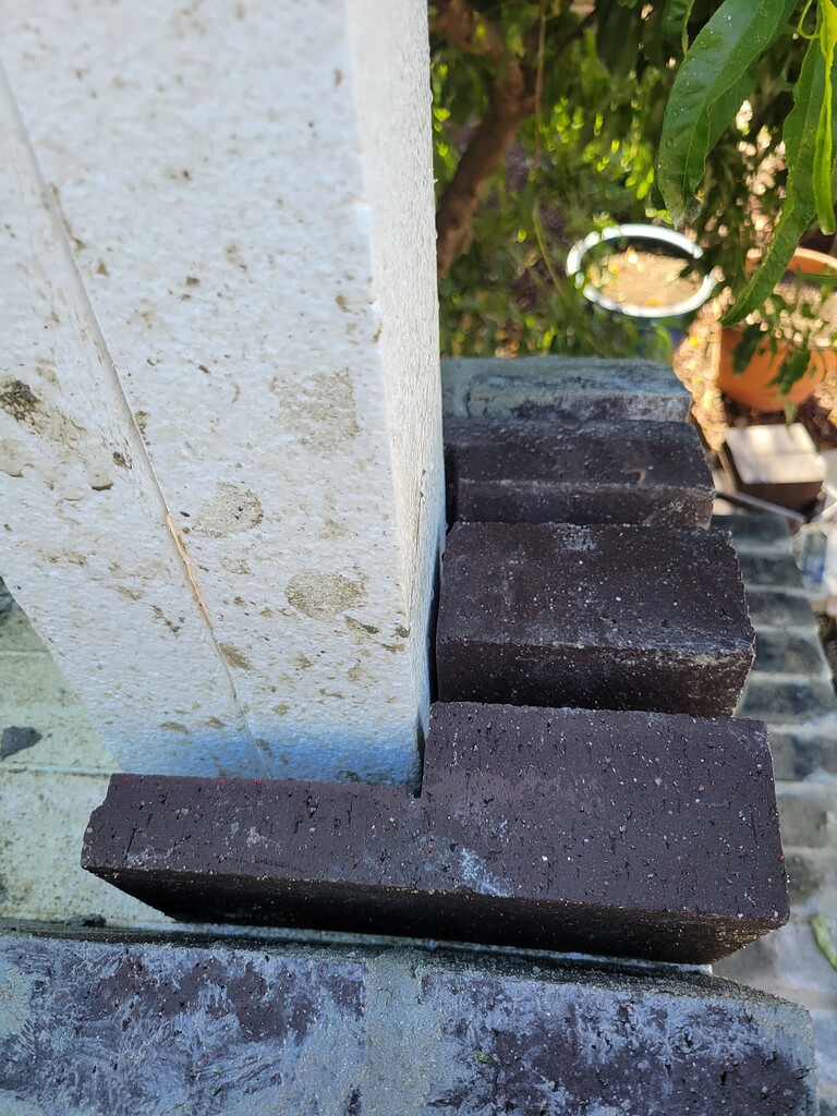 Mortaring Notched Fire Brick around the Chimney - Mattone Barile ...